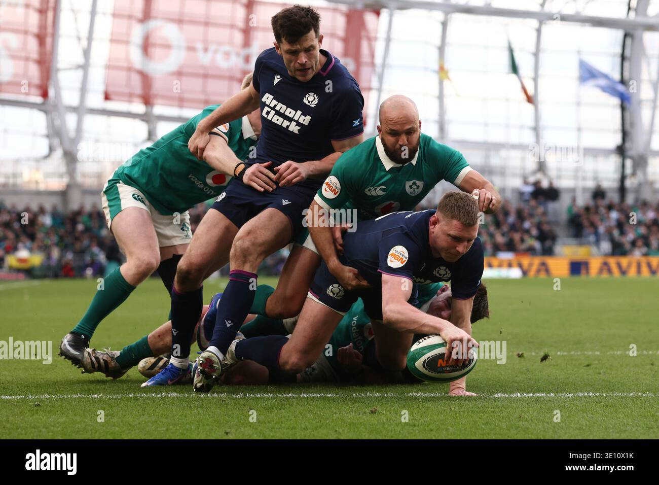 Scotland's Finn Russell, from, scores a try during the Six Nations ...