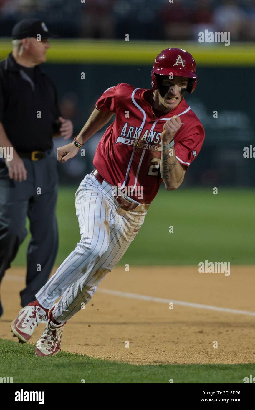 March 14, 2026: Arkansas base runner Landon Schaefer (24) rounds third ...