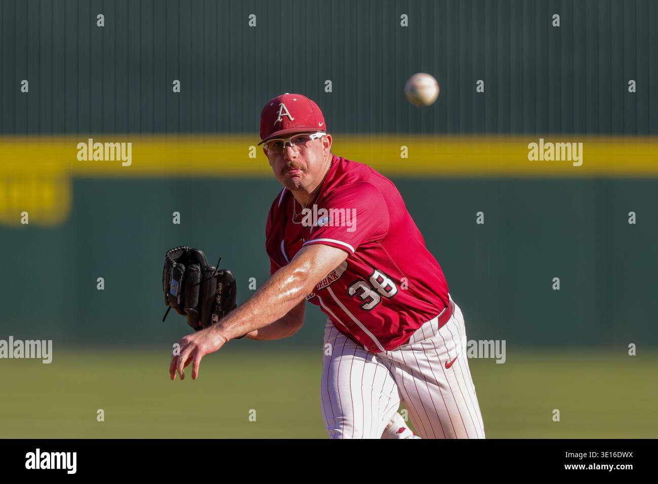March 14, 2026: Colin Fisher (38) Razorback pitcher releases the ball ...