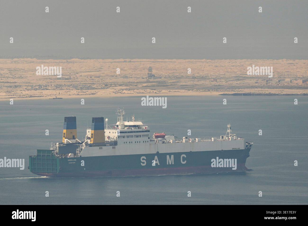A cargo ship is seen leaving the Dubai port, United Arab Emirates ...