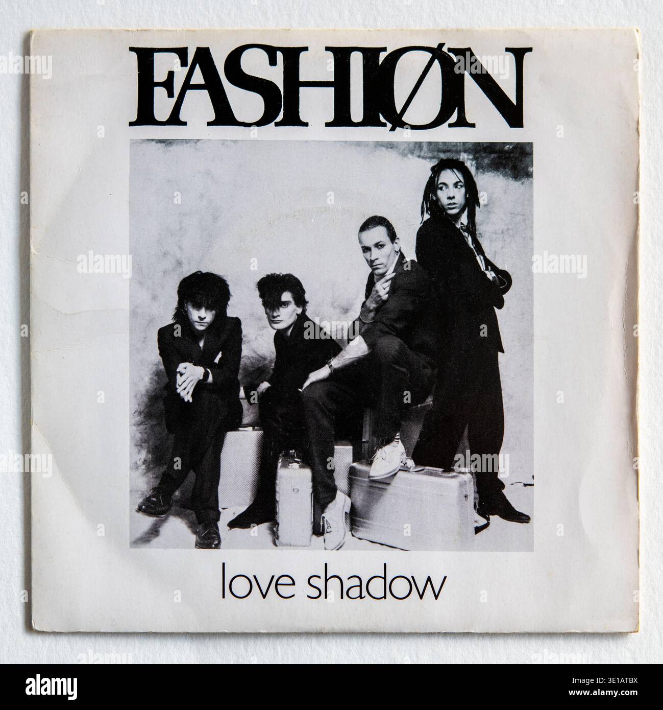Picture cover of the seven inch single version of Love Shadow by ...