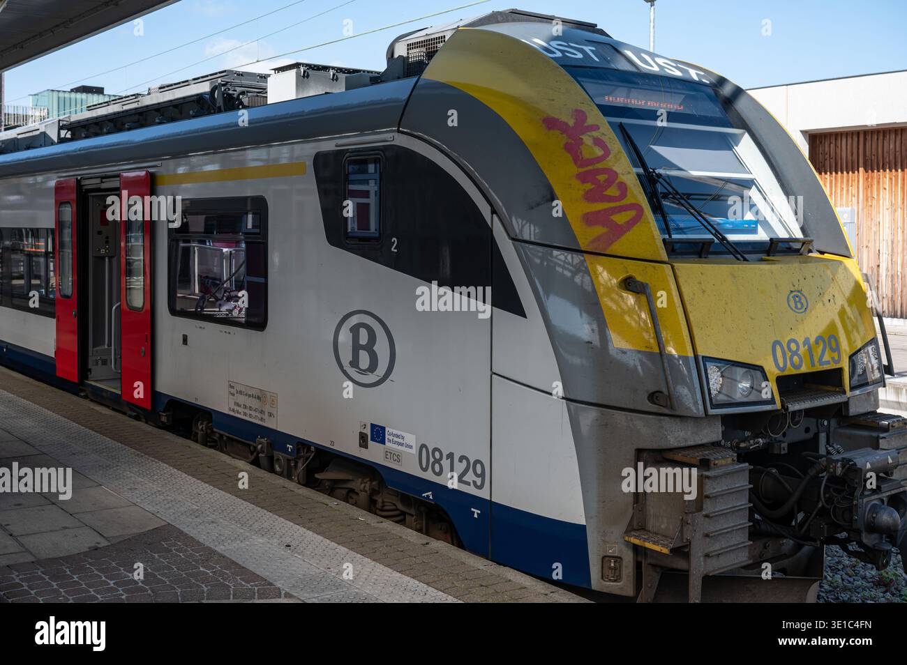 Local suburban S-train stopping at Aalst railway station in East ...
