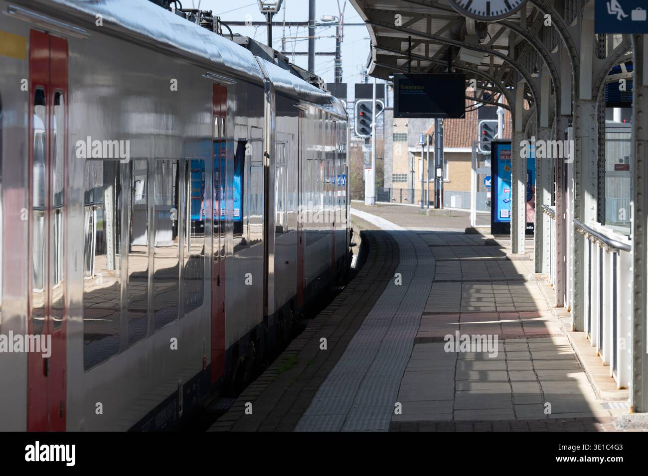 Local suburban S-train stopping at Aalst railway station in East ...