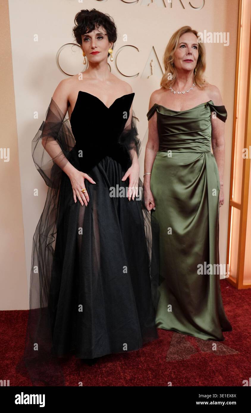 Taryn Gould, left, and Chris Hegedus arrive at the Oscars on Sunday ...