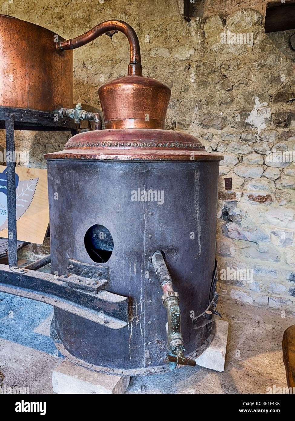 An old copper alembic pot still is used to distill apple spirits into ...