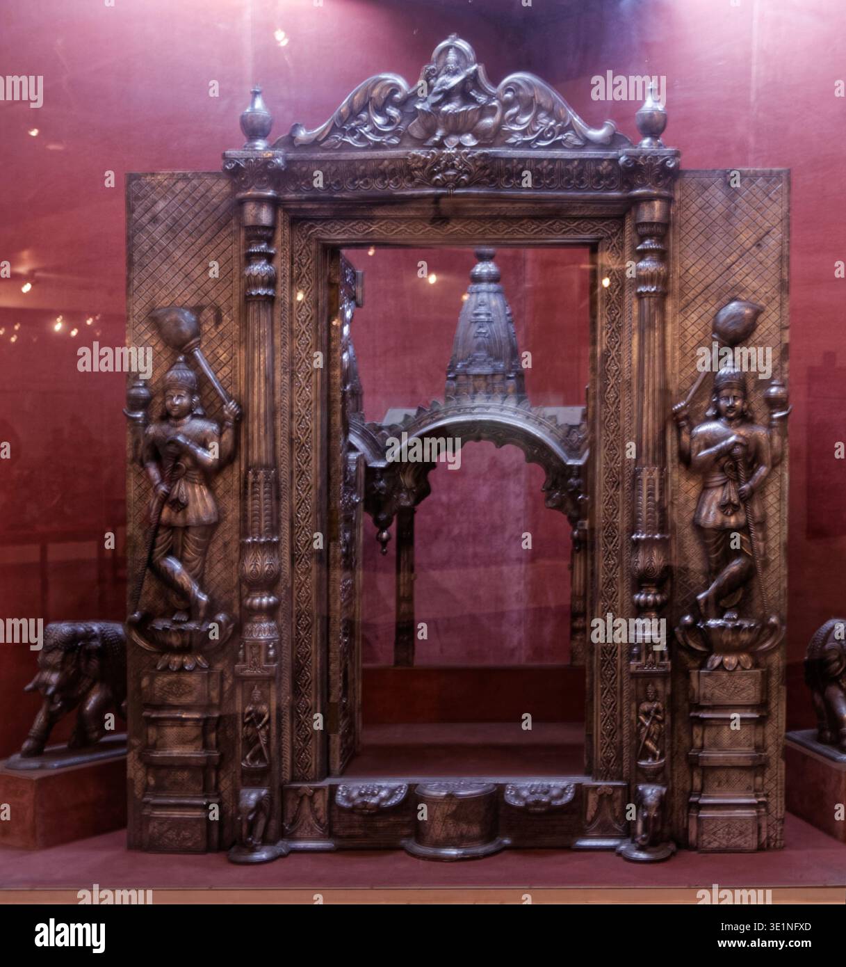 The exterior gate of a temple in Delhi features a raised threshold ...