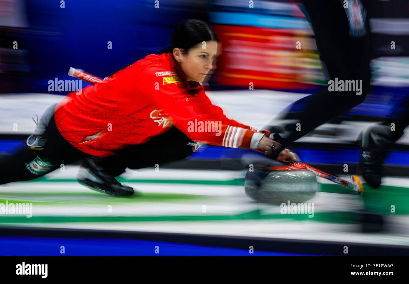 Team Canada skip Kerri Einarson delivers a stone against Denmark at the ...