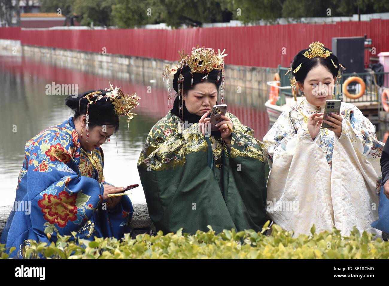 Tourists wearing Ming-style Hanfu stroll through the Forbidden City in ...