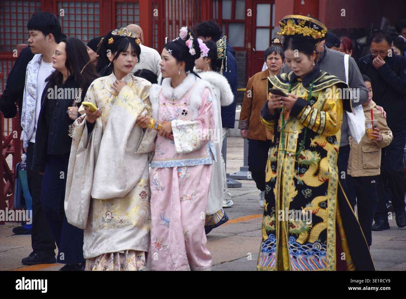 Tourists wearing Ming-style Hanfu stroll through the Forbidden City in ...