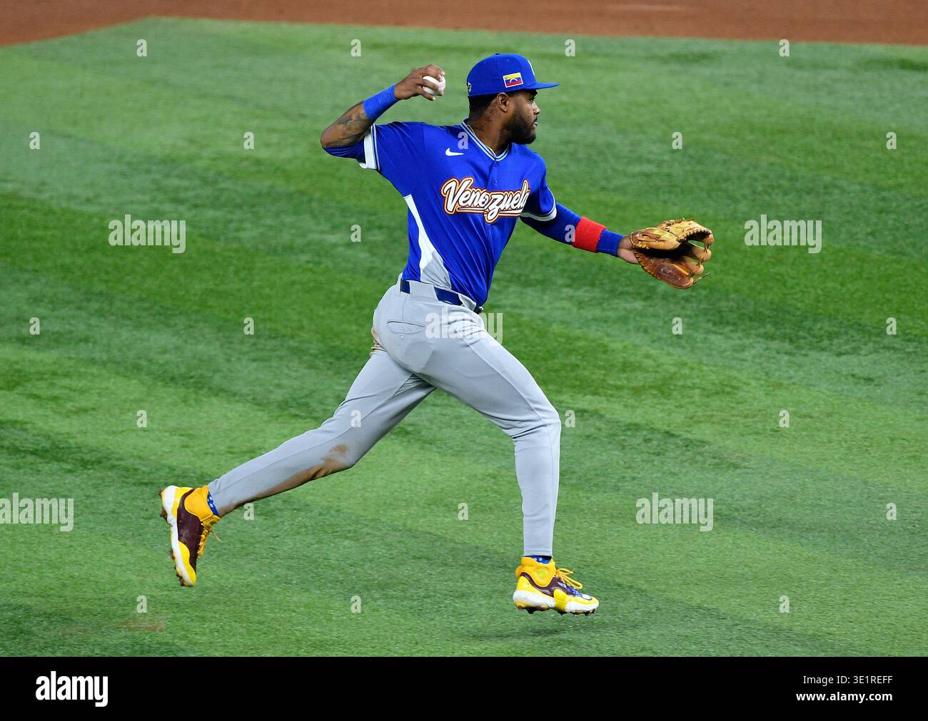 Venezuela third baseman Maikel Garcia throws to first base after ...