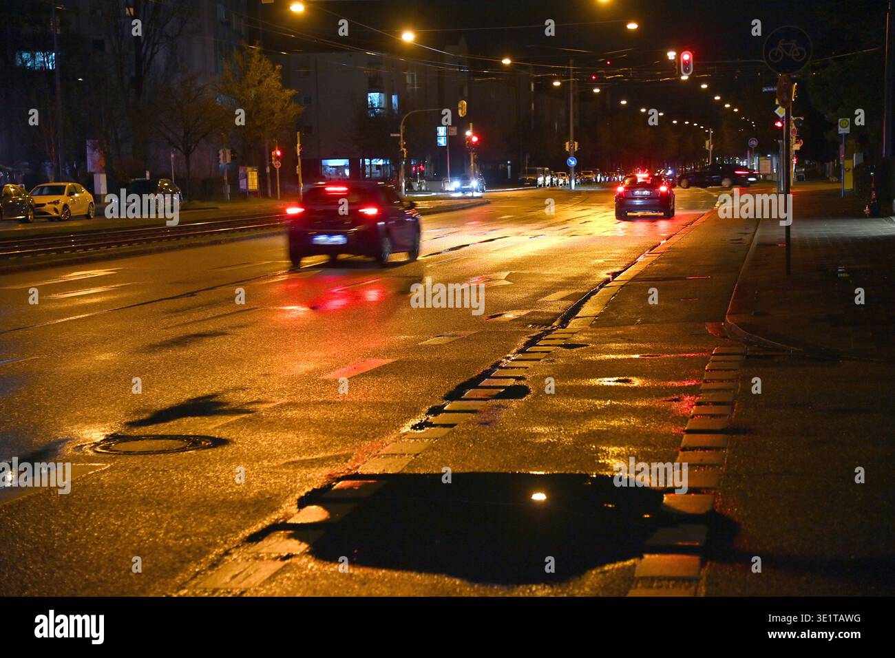 Speeders in road traffic at night with excessive speed. Evening road ...