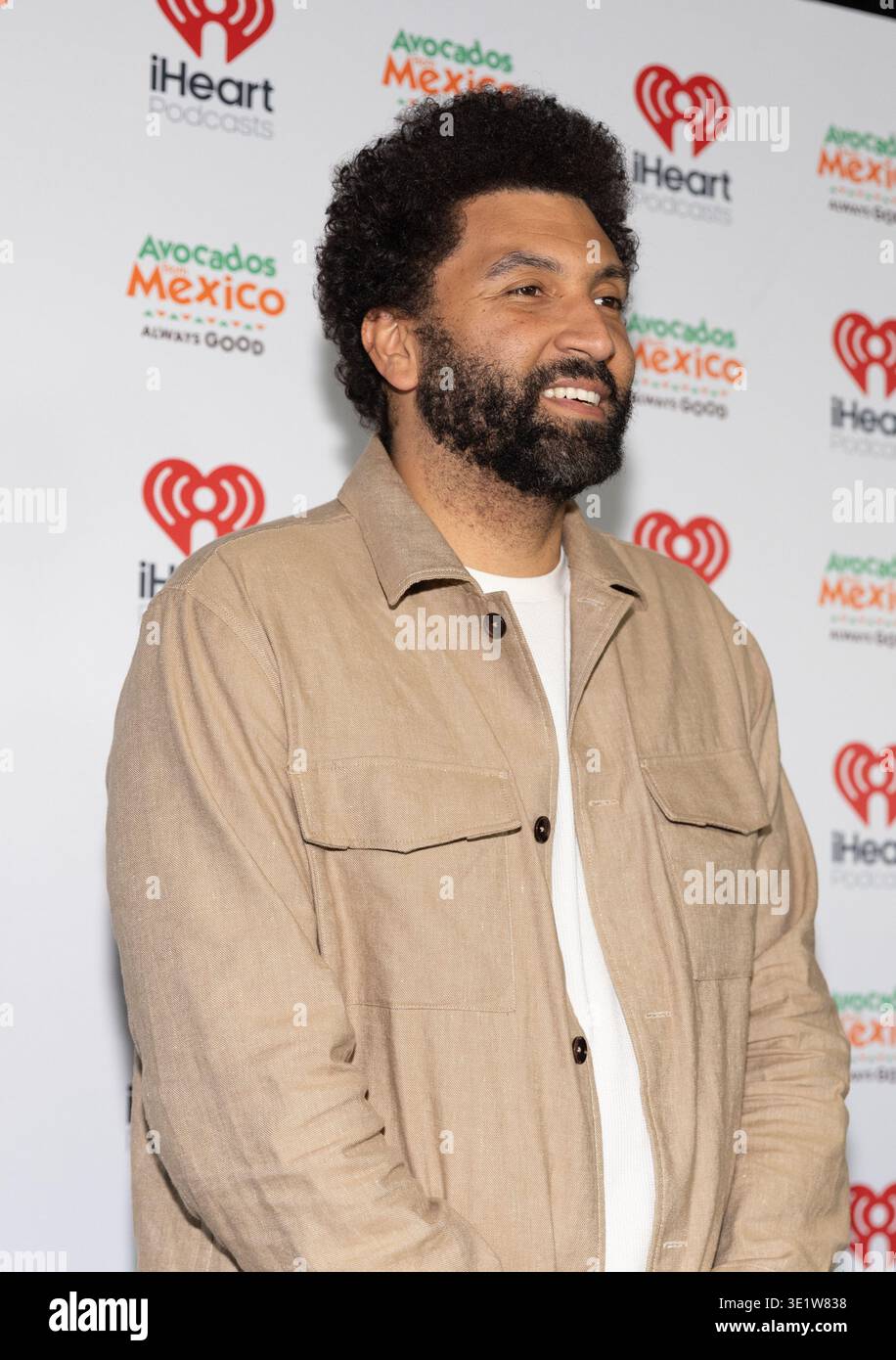 Justin Richmond walks the red carpet at the iHeart Podcast Awards at ...