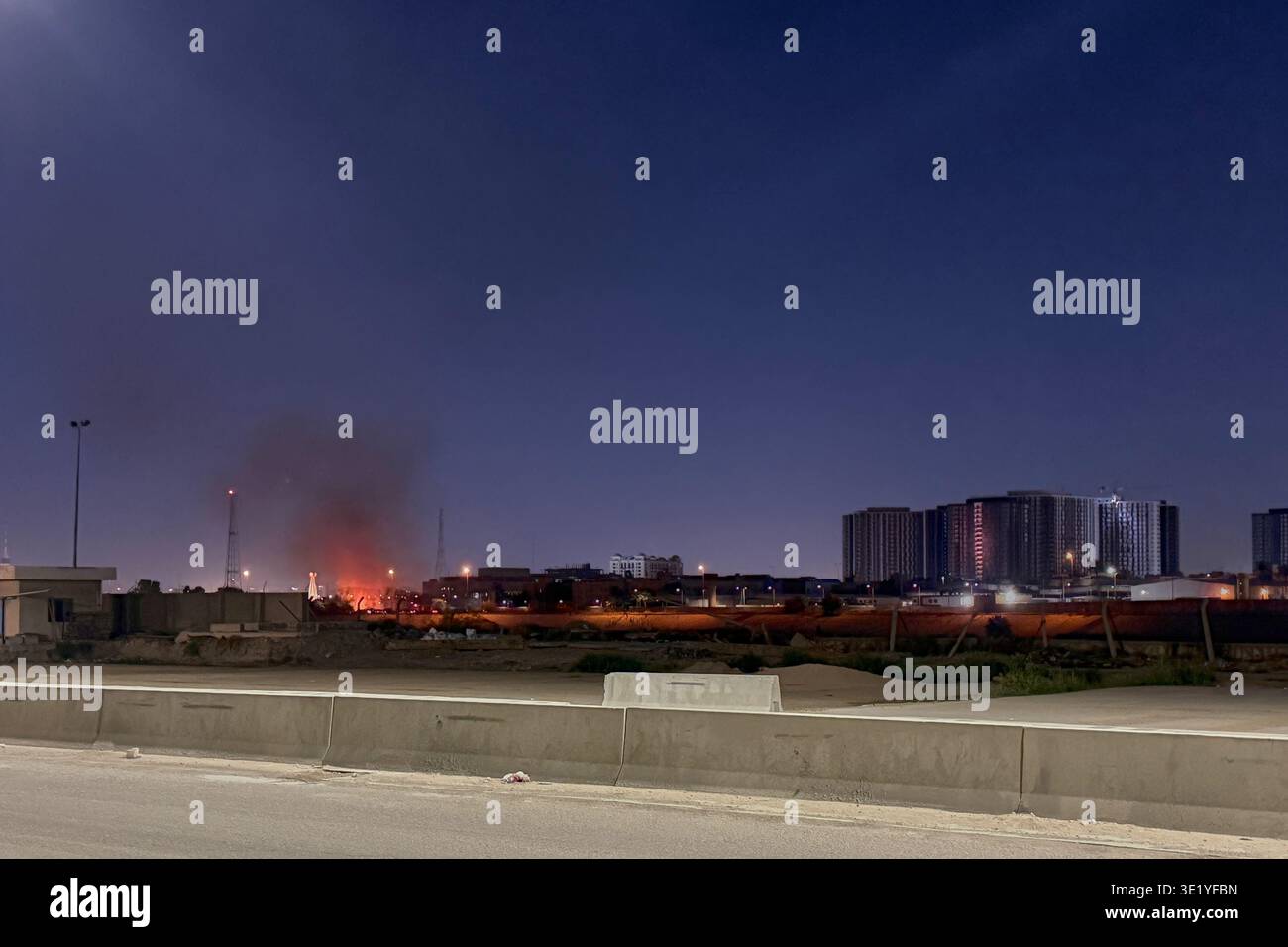 Flames appear to engulf a structure inside the compound of the U.S ...