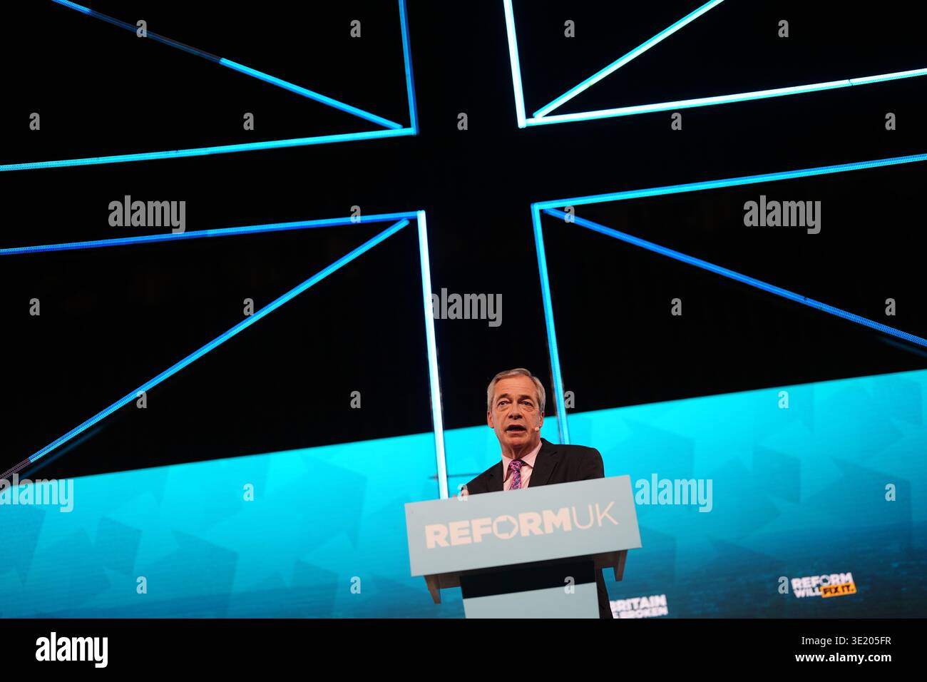 Reform UK leader Nigel Farage speaks during a rally at the Arena MK ...