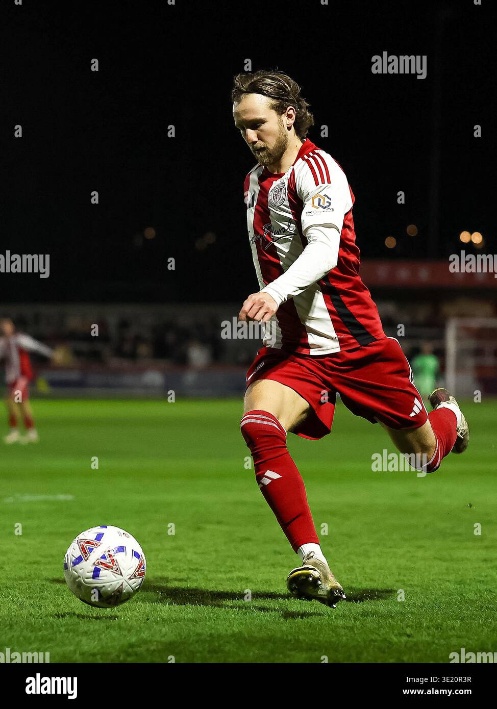 BRACKLEY, ENGLAND - MARCH 17: Morgan Roberts of Brackley Town crosses ...