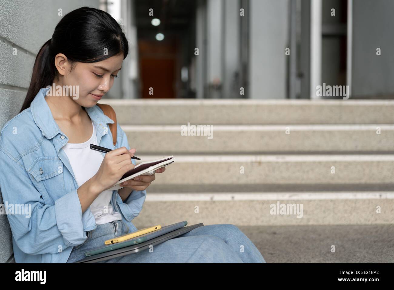 Portrait beautiful Asian woman student. Smile girl happy study. Write ...