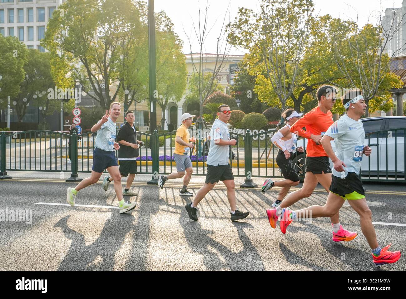 Runners compete in the 2026 Shanghai Half Marathon in Shanghai, China ...