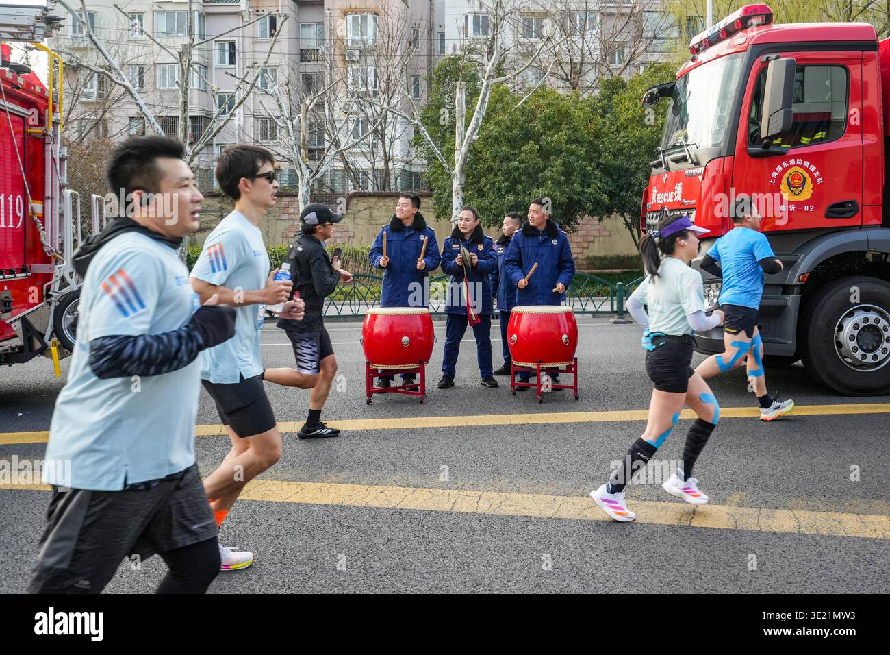 Runners compete in the 2026 Shanghai Half Marathon in Shanghai, China ...