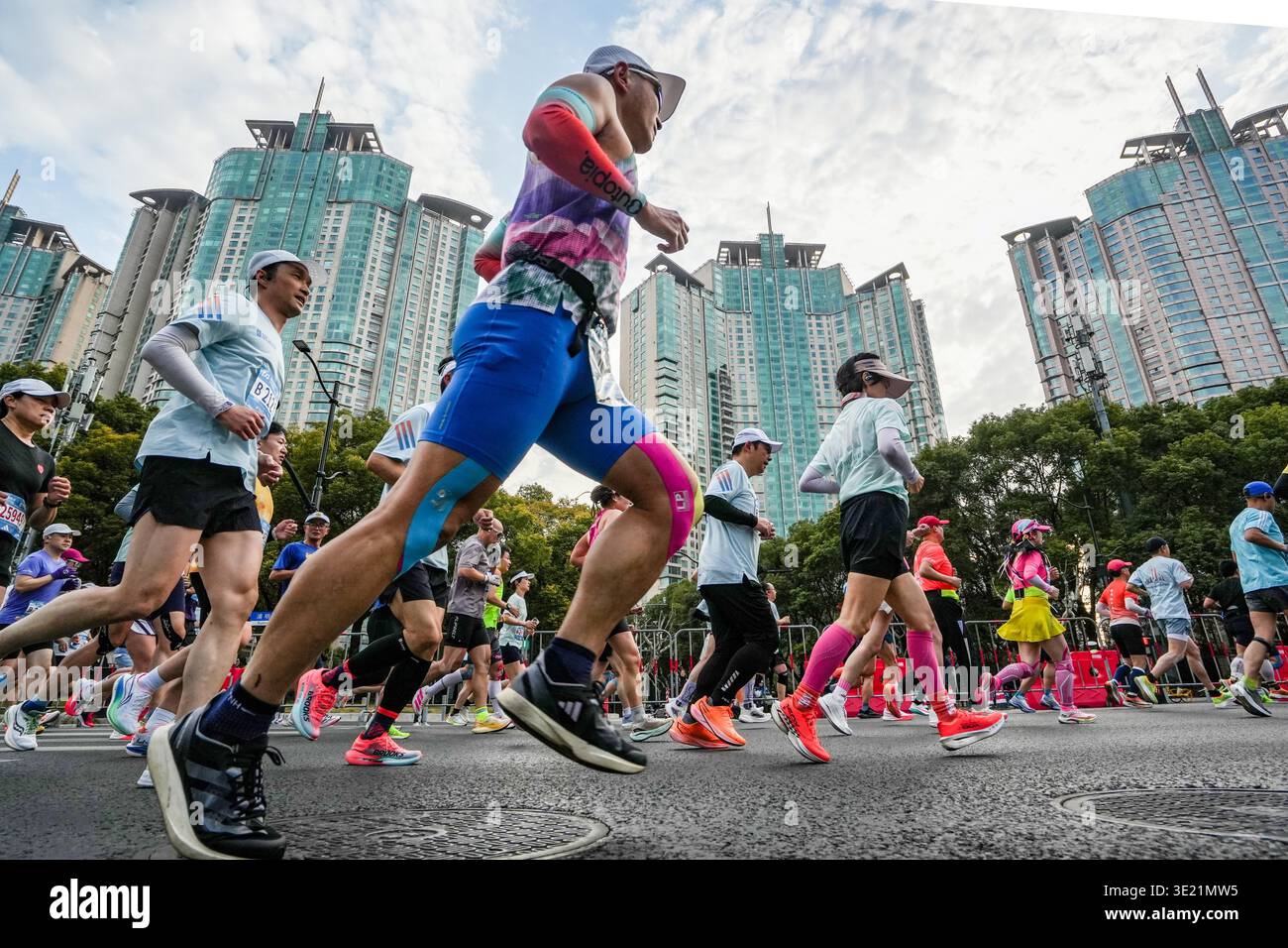 Runners compete in the 2026 Shanghai Half Marathon in Shanghai, China ...