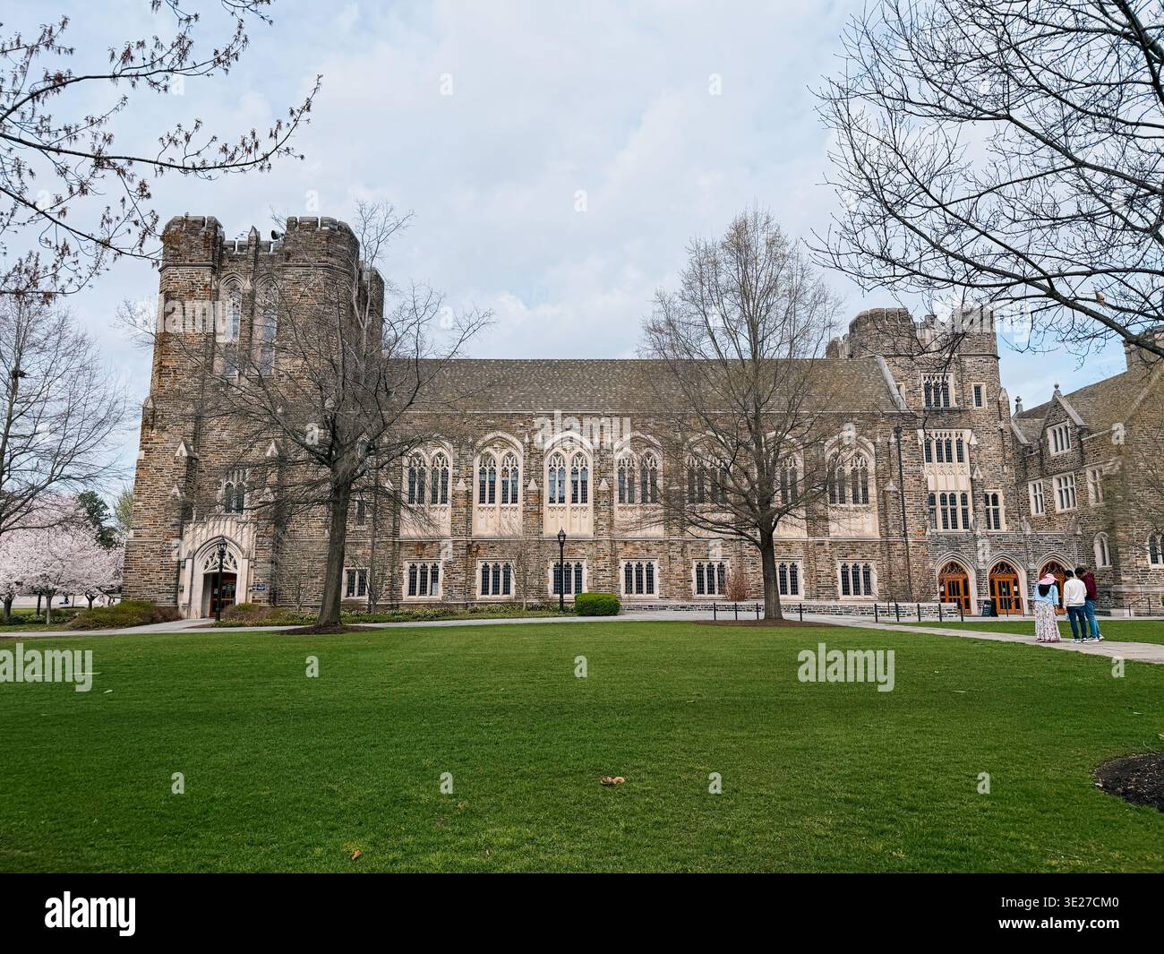 Gothic academic building at Duke University overlooking a green lawn ...