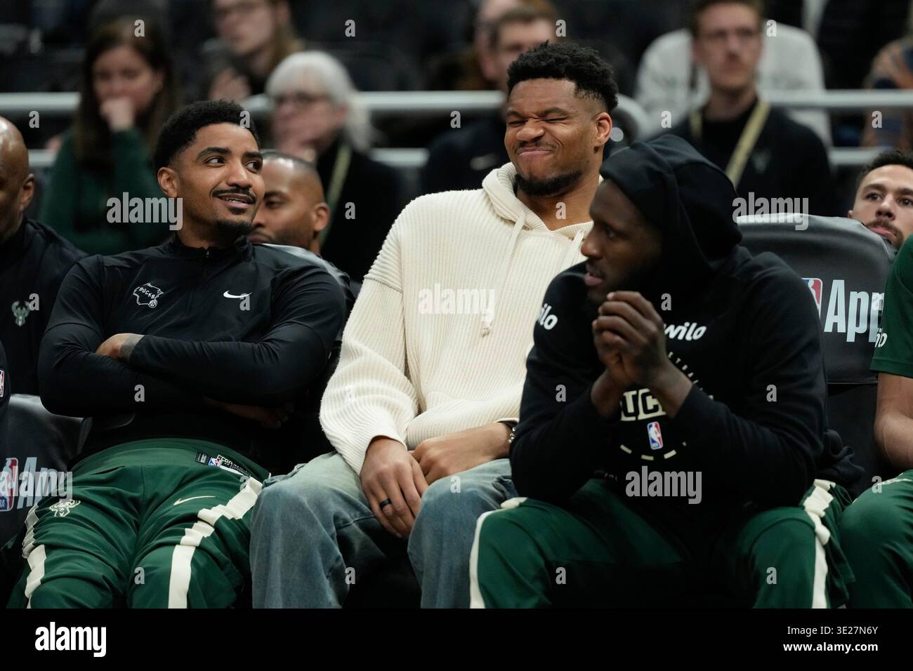 Milwaukee Bucks' Giannis Antetokounmpo jokes with Gary Harris and ...