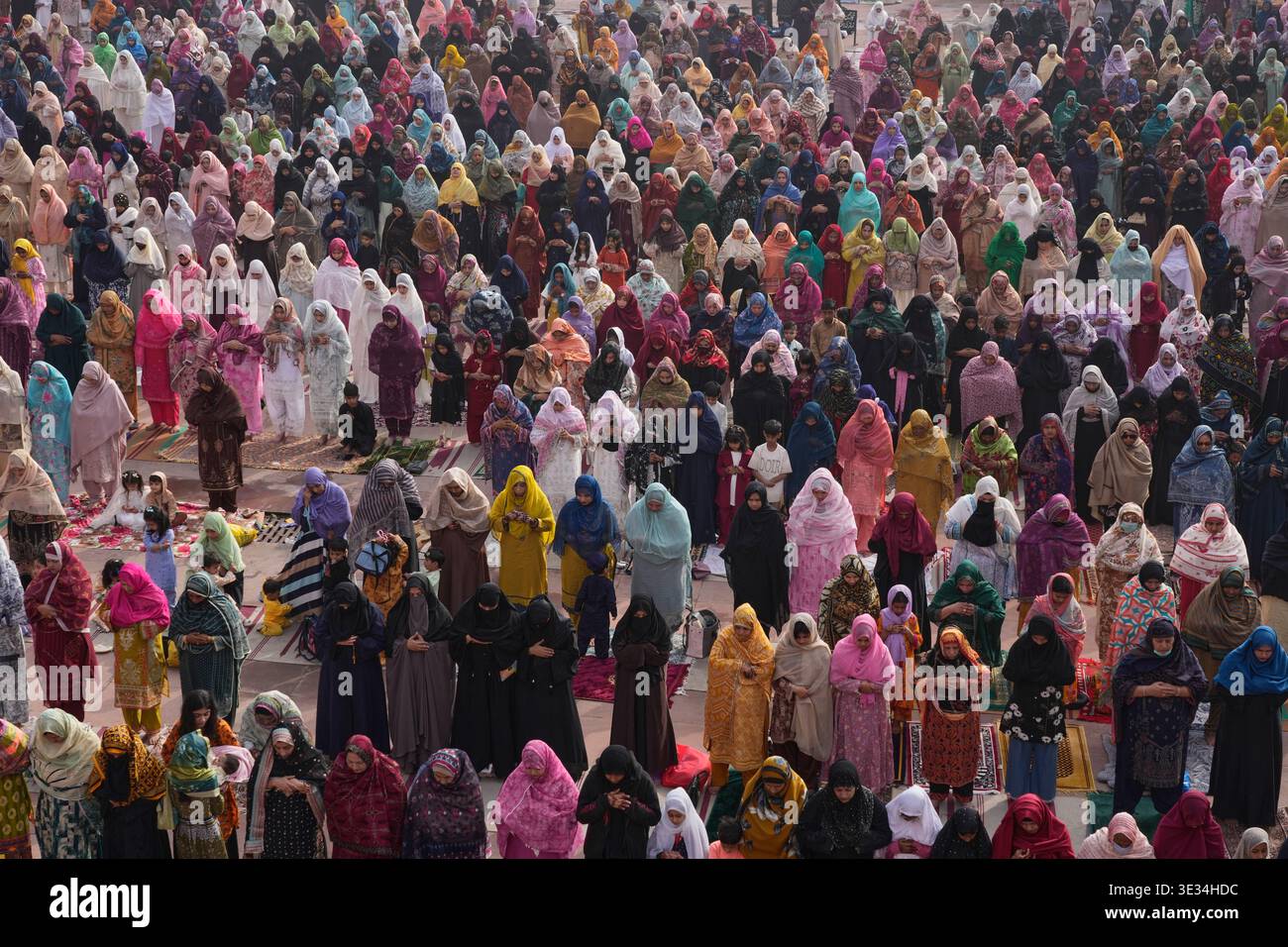 Muslims women perform Eid al-Fitr prayer, marking the end of the Muslim ...