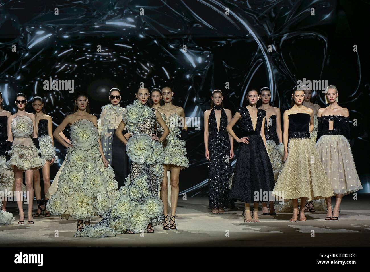 Madrid, Spain. 20th Mar, 2026. Models walk the runway wearing a design ...