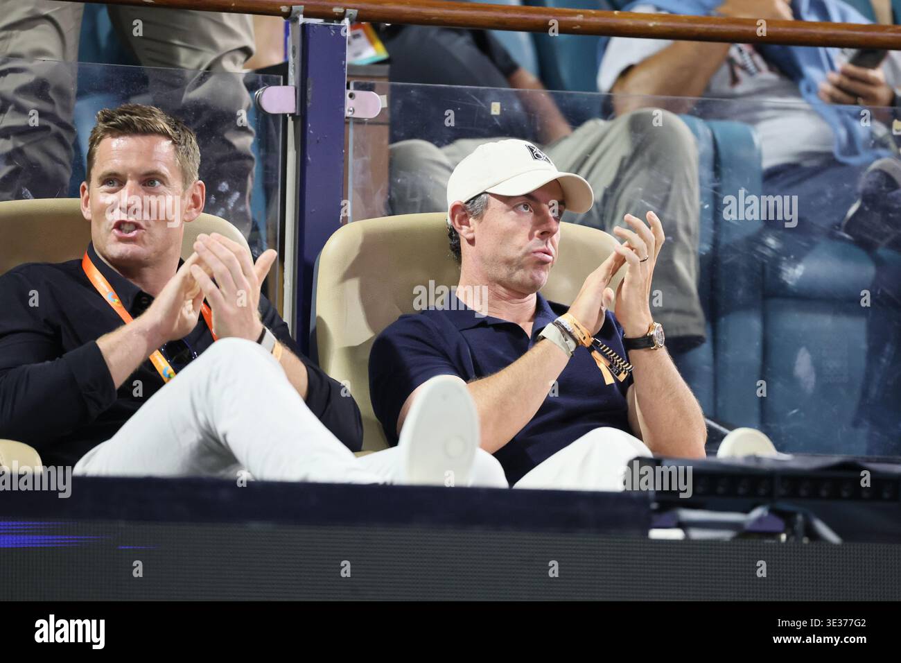 MIAMI GARDENS, FLORIDA - MARCH 20: Rory McIlroy watches Carlos Alcaraz ...