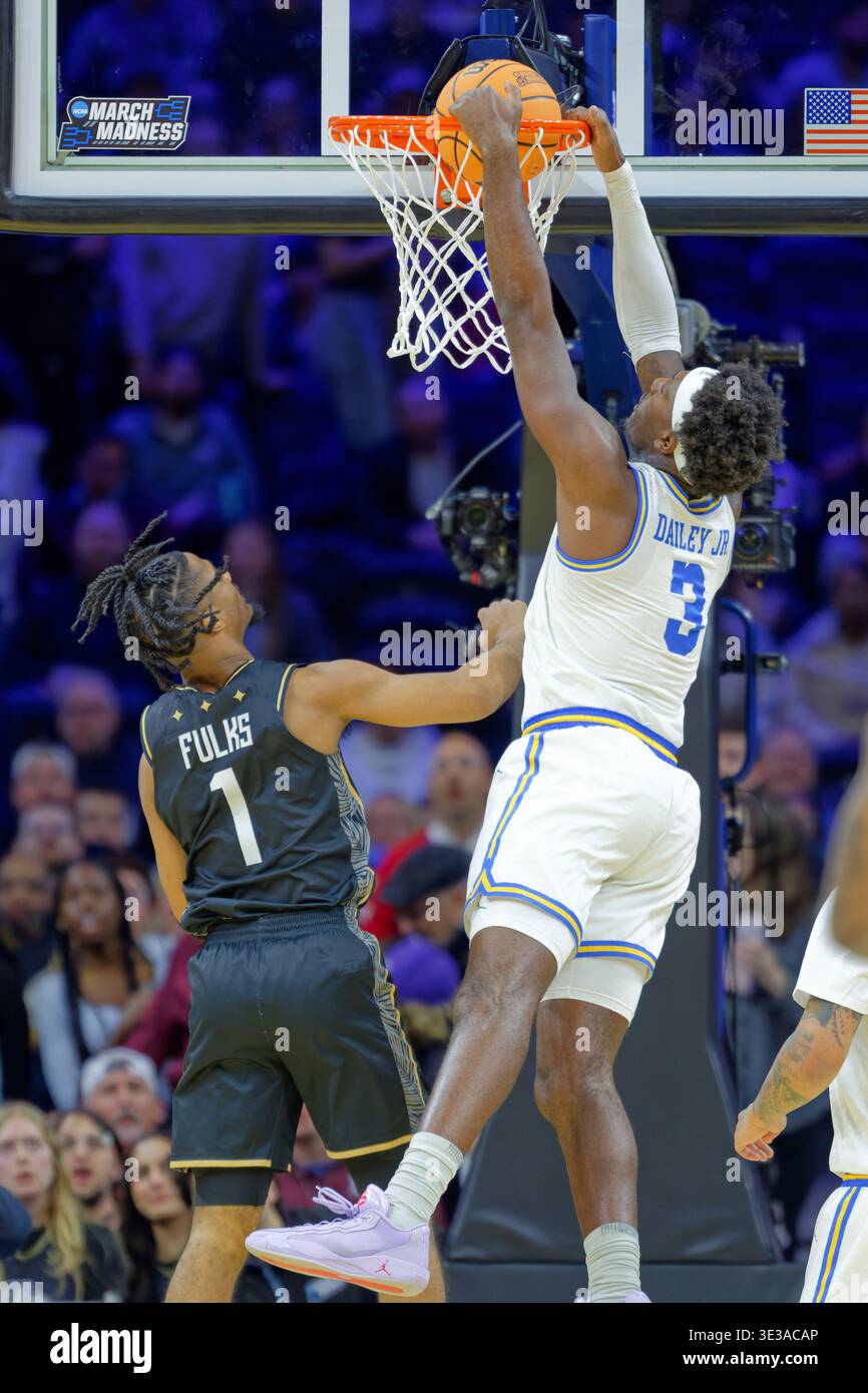 UCLA Guard/Forward Eric Dailey Jr. (3) slam dunks a ball during a first ...