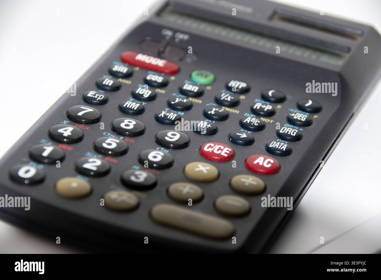 Vintage calculator showing numbers and math symbols Stock Photo - Alamy