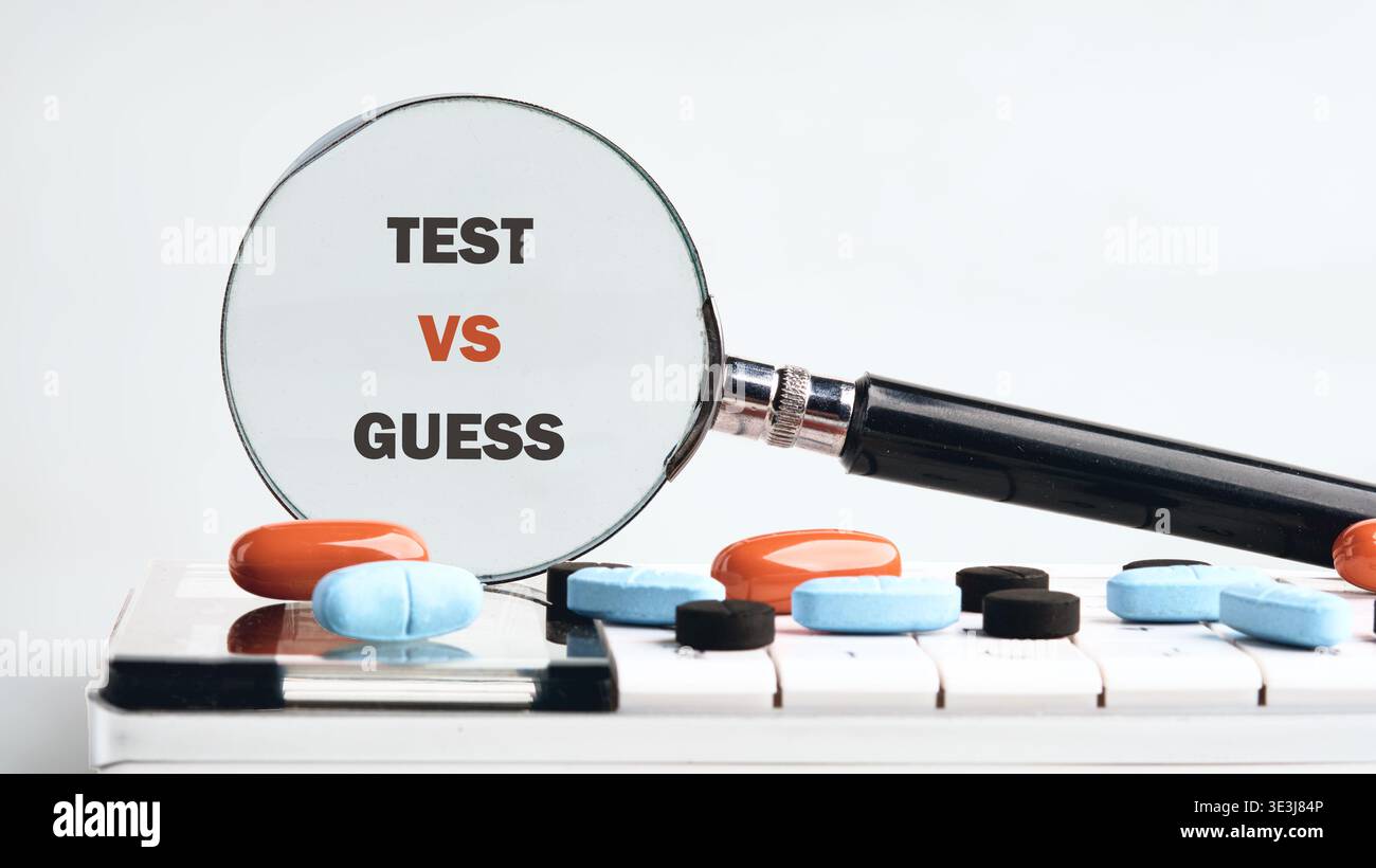 A clear magnifying glass highlights the words TEST VS GUESS on a stark ...