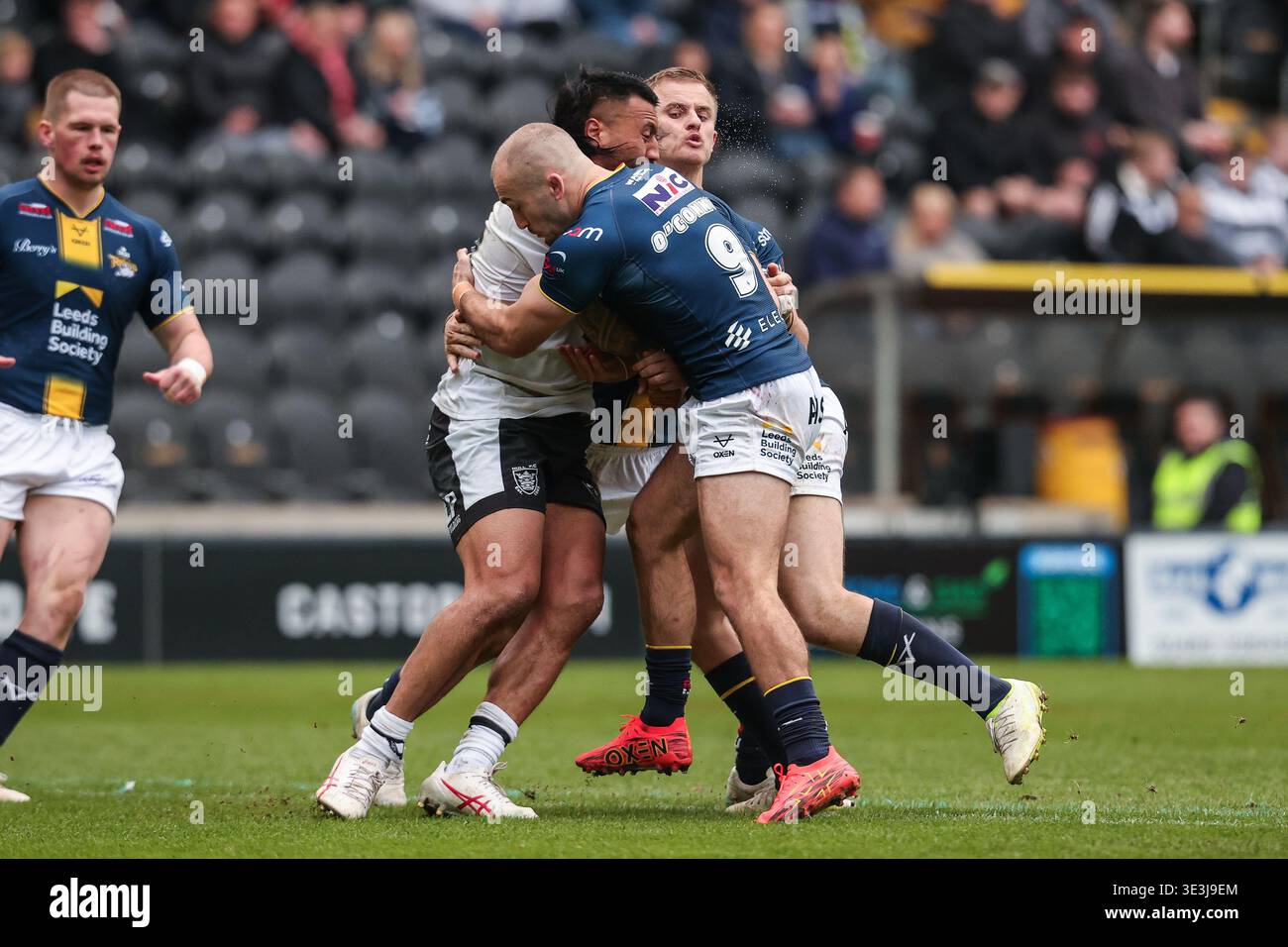 Ligi Sao of Hull FC is tackled by Jarrod O'Connor of Leeds Rhinos ...