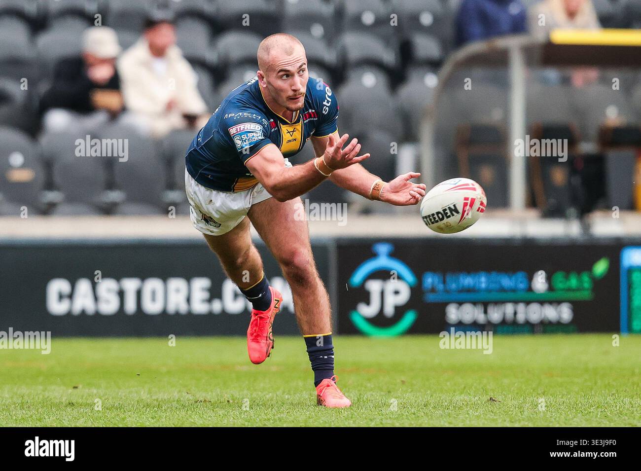 Jarrod O'Connor of Leeds Rhinos passes the ball during the Hull FC v ...