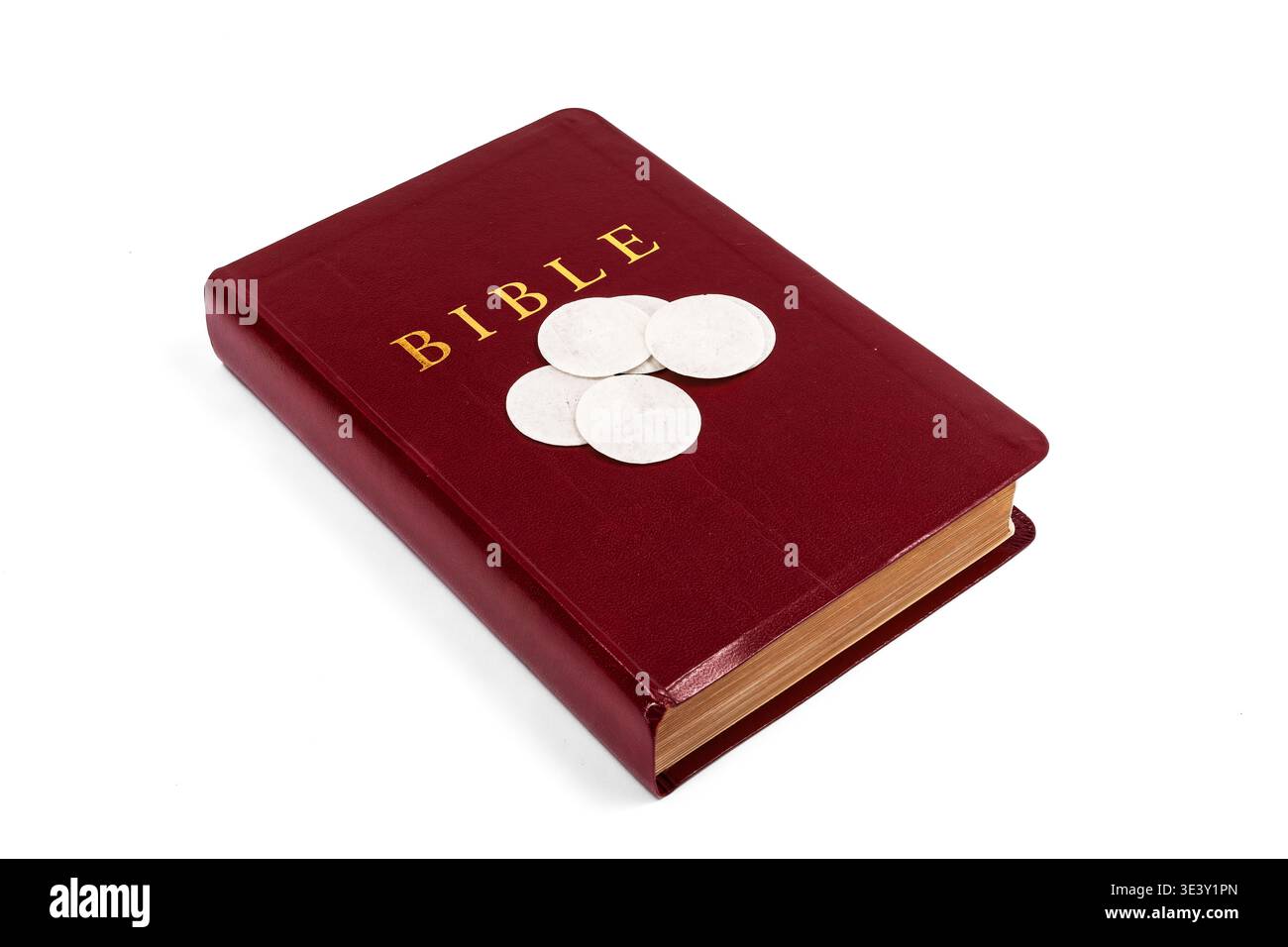 Holy Bible with communion wafers on red cover. Christian Eucharist ...