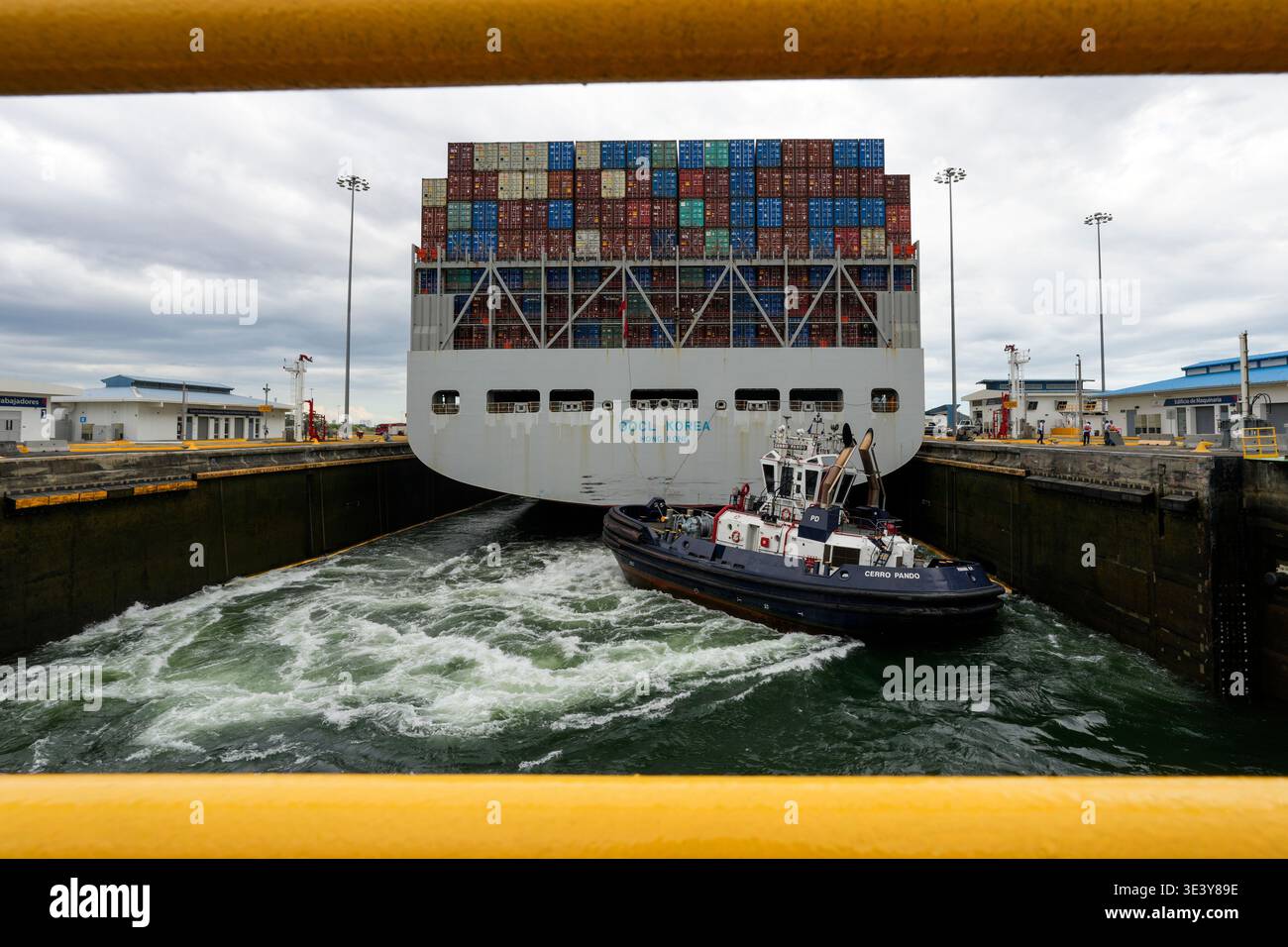 A cargo ship goes through the Panama Canal's Cocoli Locks in Panama ...