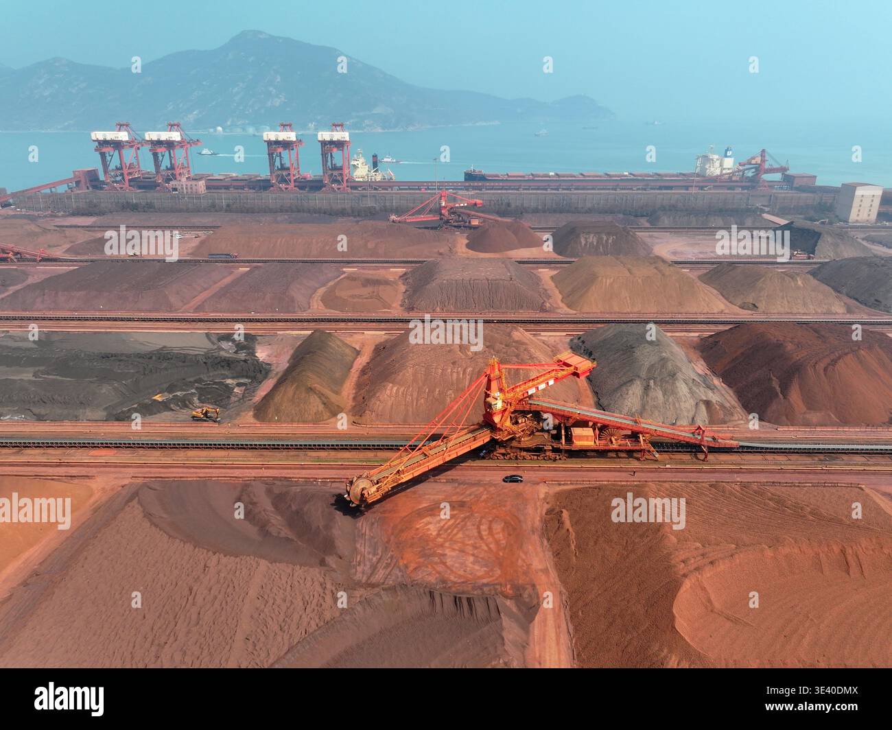 Trains transport imported iron ore at Xinsu Port Terminal in ...