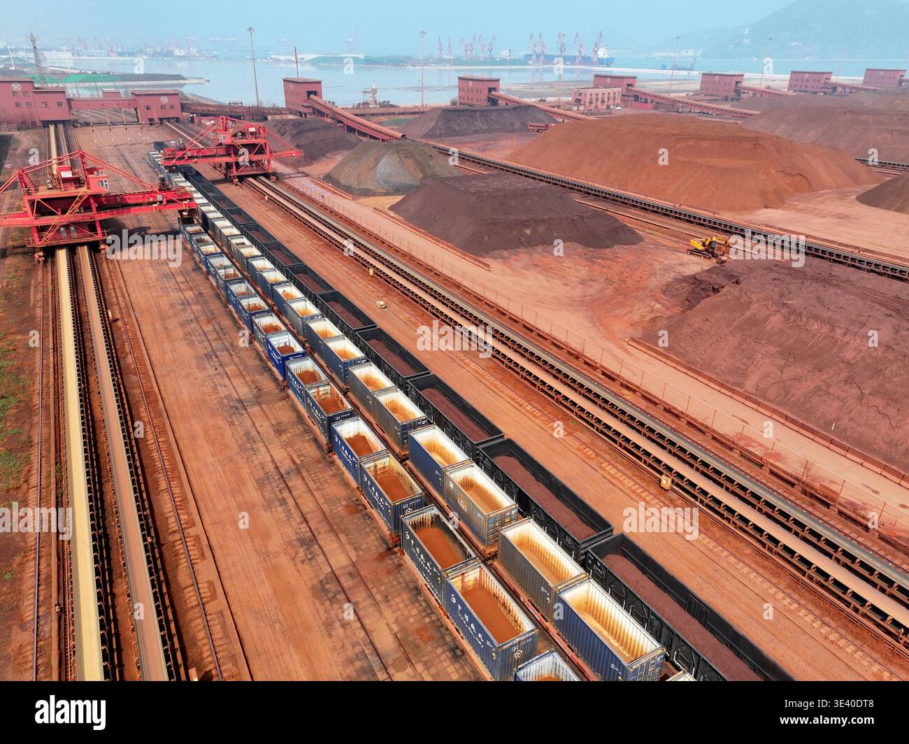 Trains transport imported iron ore at Xinsu Port Terminal in ...
