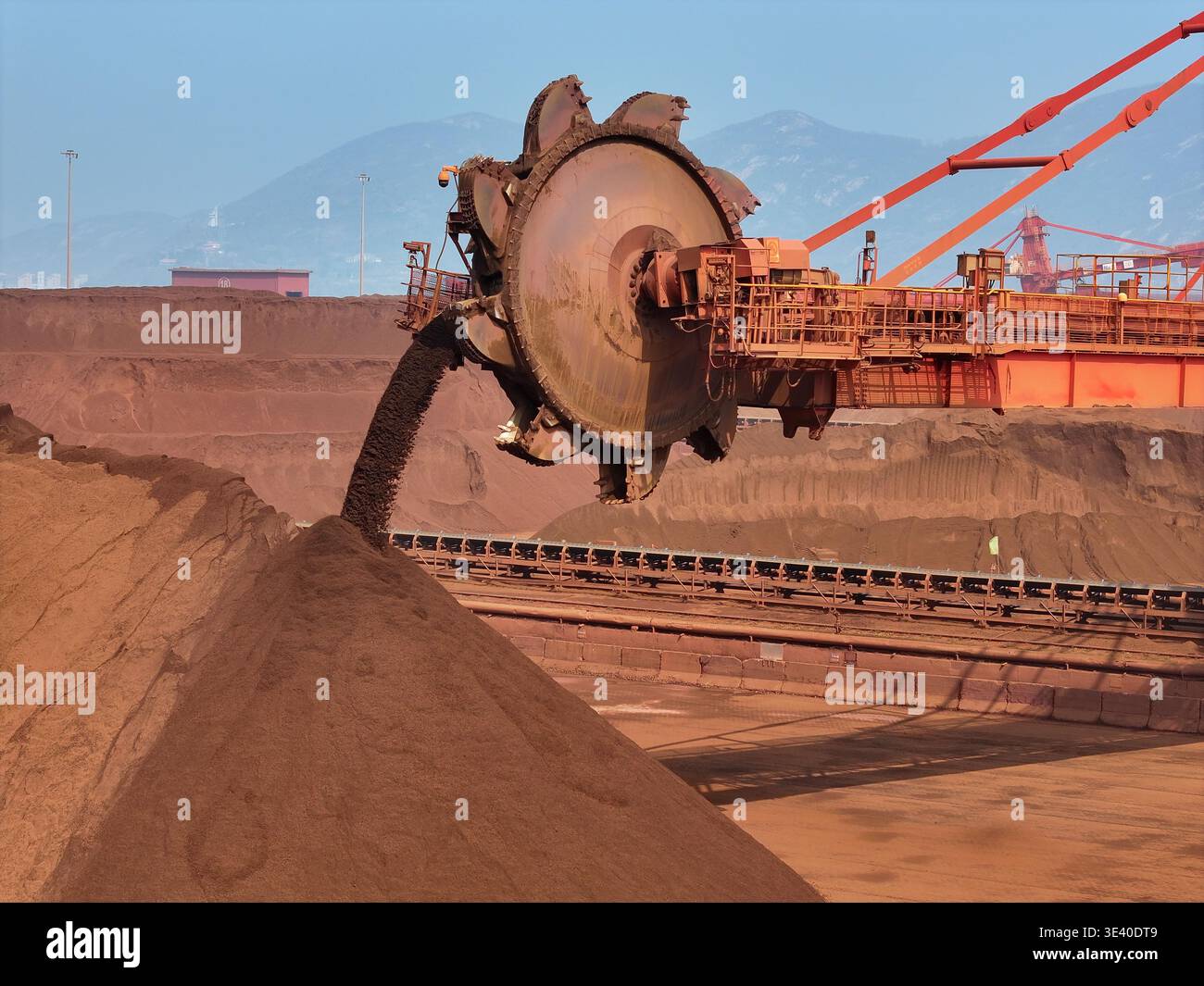 Trains transport imported iron ore at Xinsu Port Terminal in ...