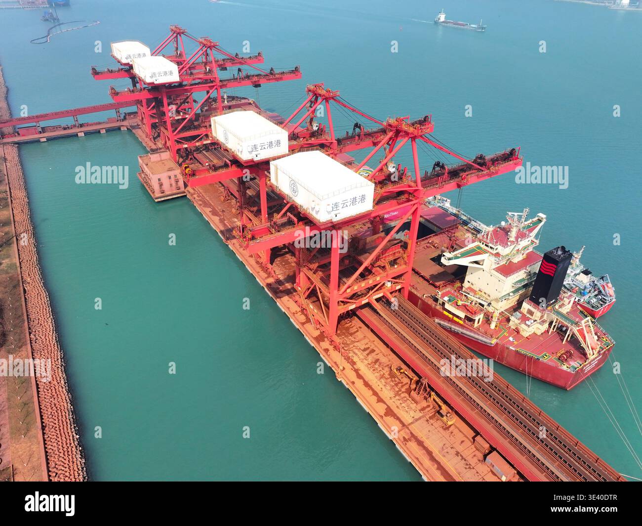 Trains transport imported iron ore at Xinsu Port Terminal in ...