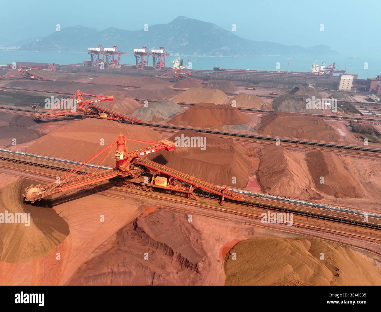 Trains transport imported iron ore at Xinsu Port Terminal in ...