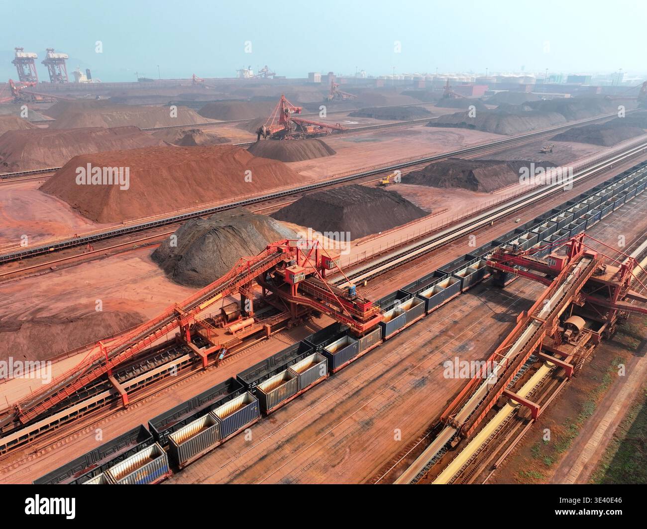 Trains transport imported iron ore at Xinsu Port Terminal in ...