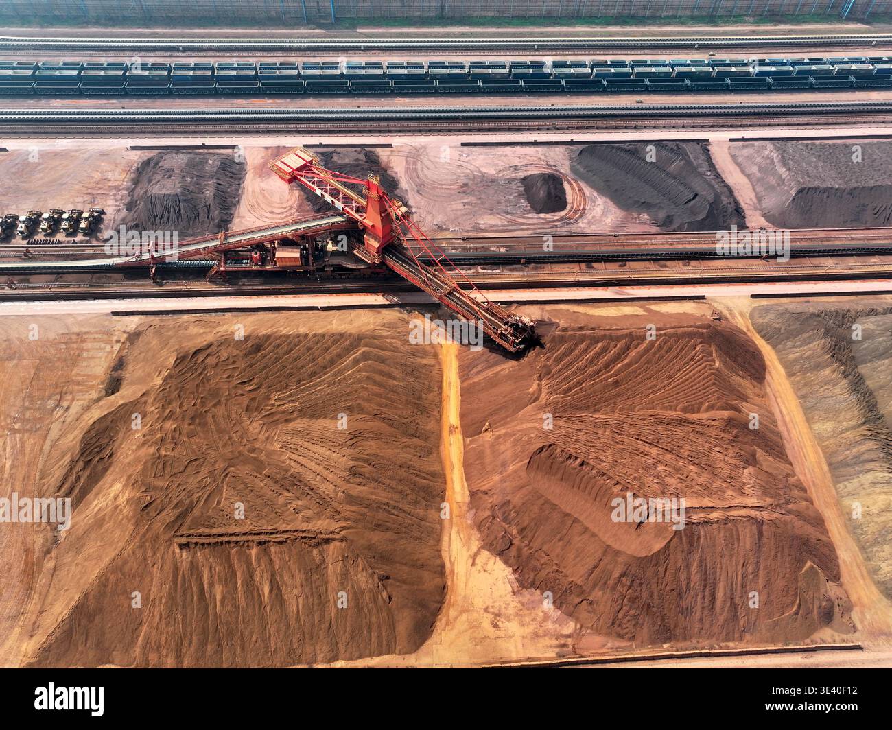Trains transport imported iron ore at Xinsu Port Terminal in ...