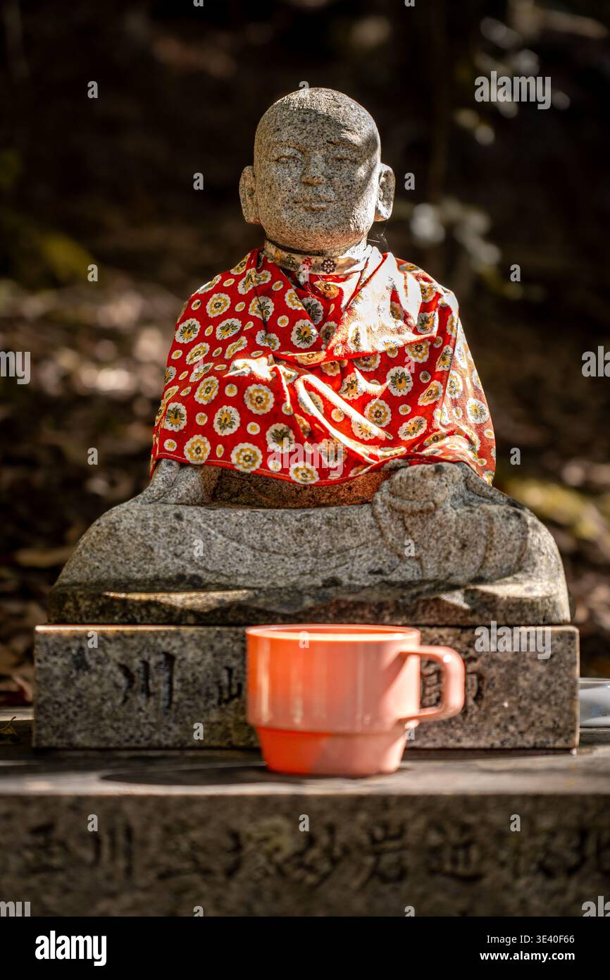 Smiling Small Stone Jizo Monk Statue with Red Bib and Cup at Saigoku 33 ...