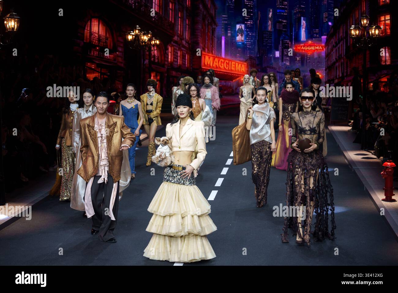 Models wear a creation by Maggie Ma during China Fashion Week (Spring ...