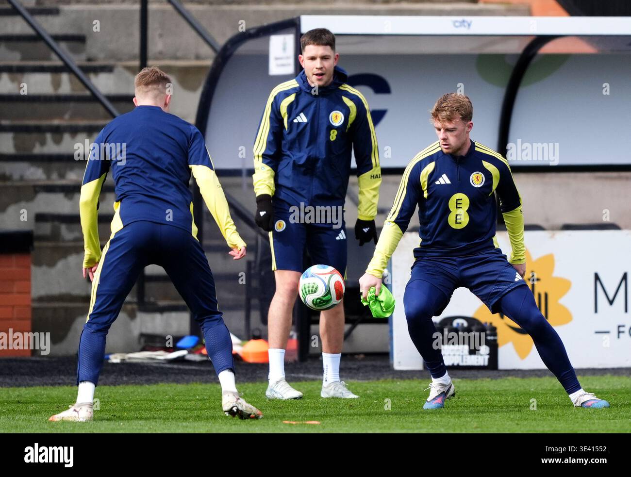 Scotland's George Hirst (centre) and Tommy Conway (right) during a ...