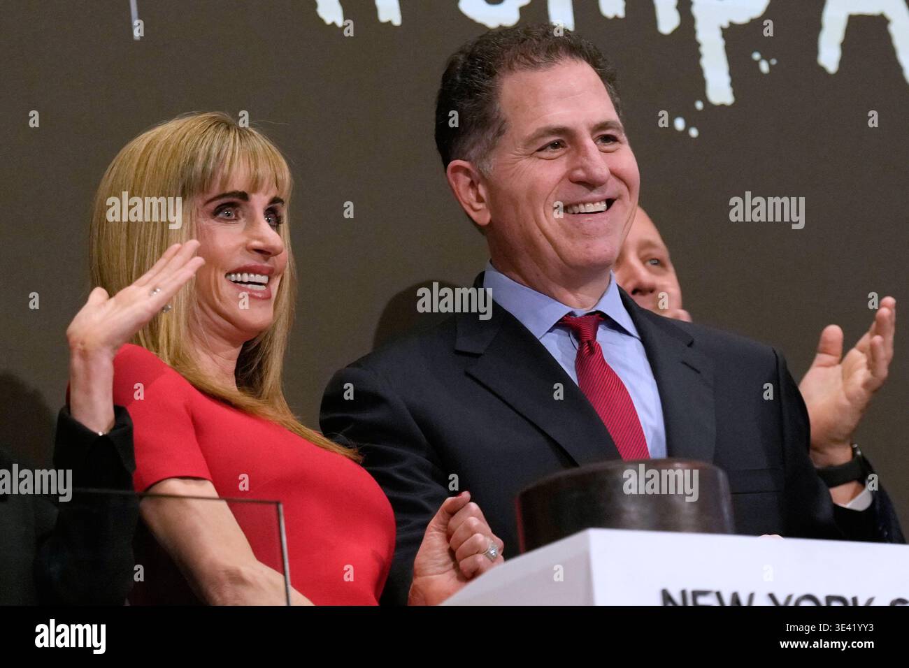 Michael and Susan Dell ring the opening bell at the New York Stock ...