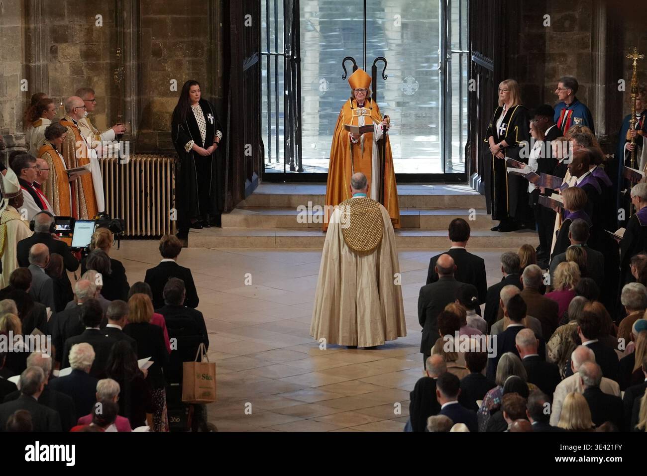 Dame Sarah Mullally stands in front of Dean of Canterbury, the Very ...