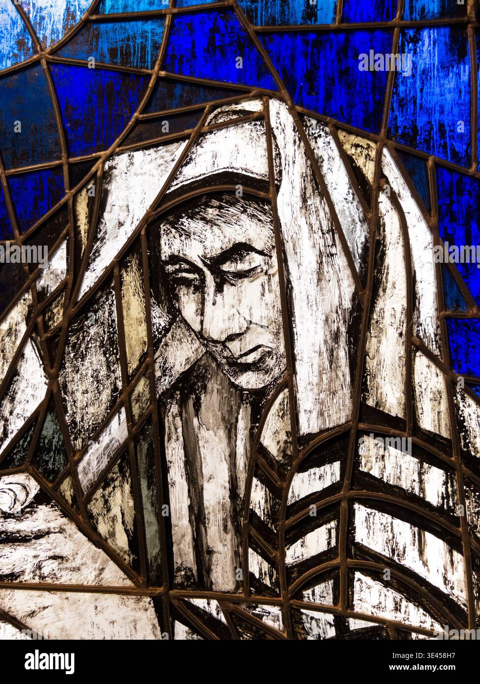 A stained glass window at a Roman synagogue shows a worshipper wrapped ...