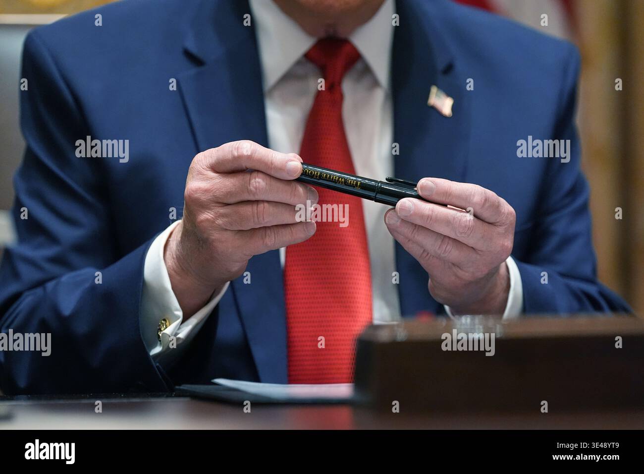 President Donald Trump holds a Sharpie pen he says was produced ...