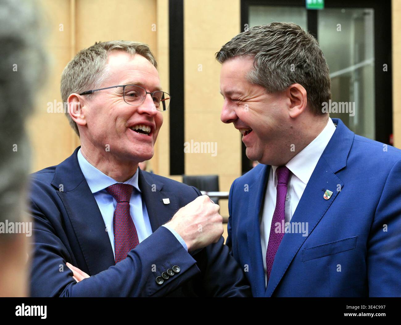 27 March 2026, Berlin: Daniel Günther (l, CDU), Minister President of ...